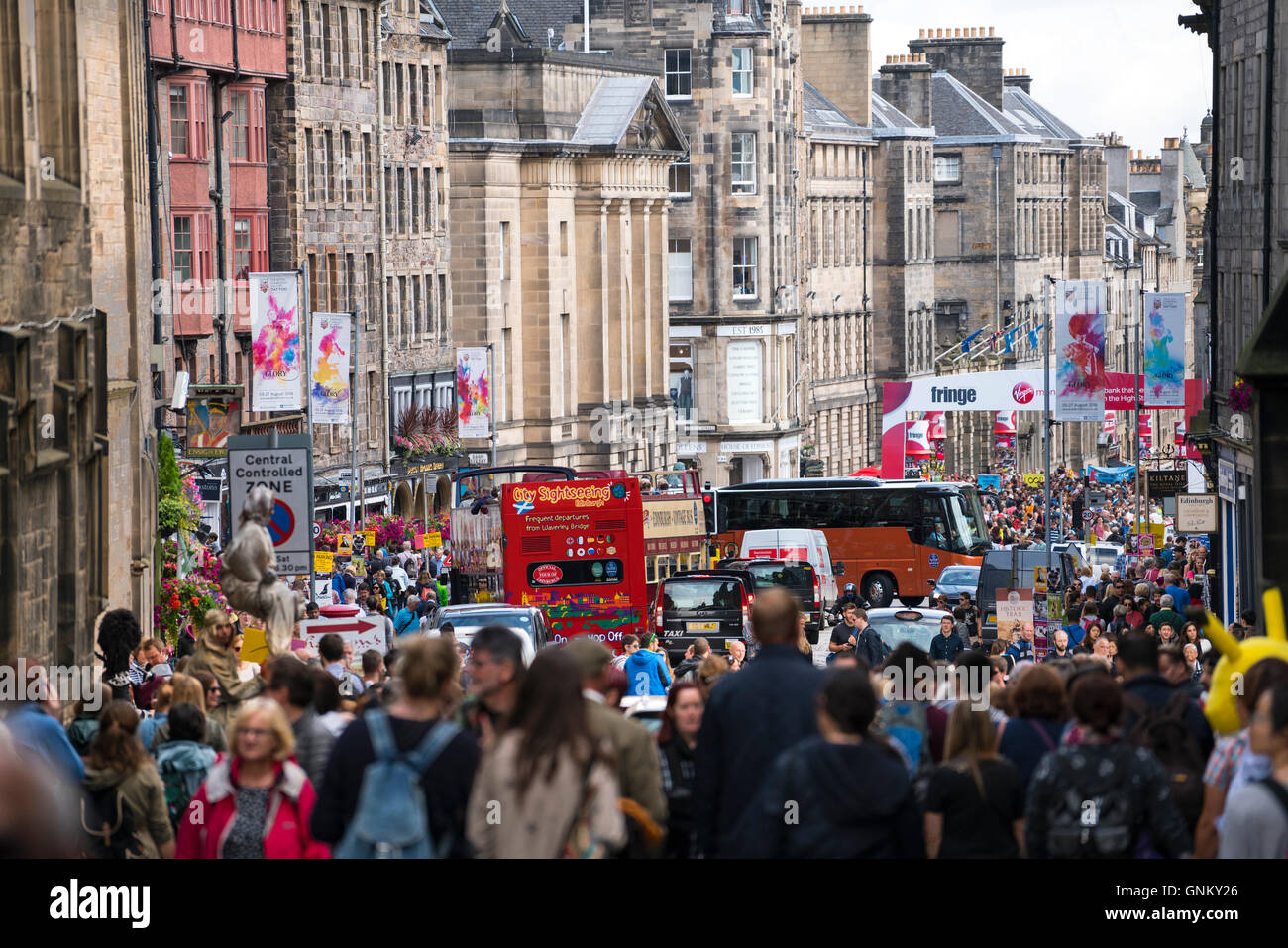 View along High Street with many people on a busy day at the Edinburgh ...