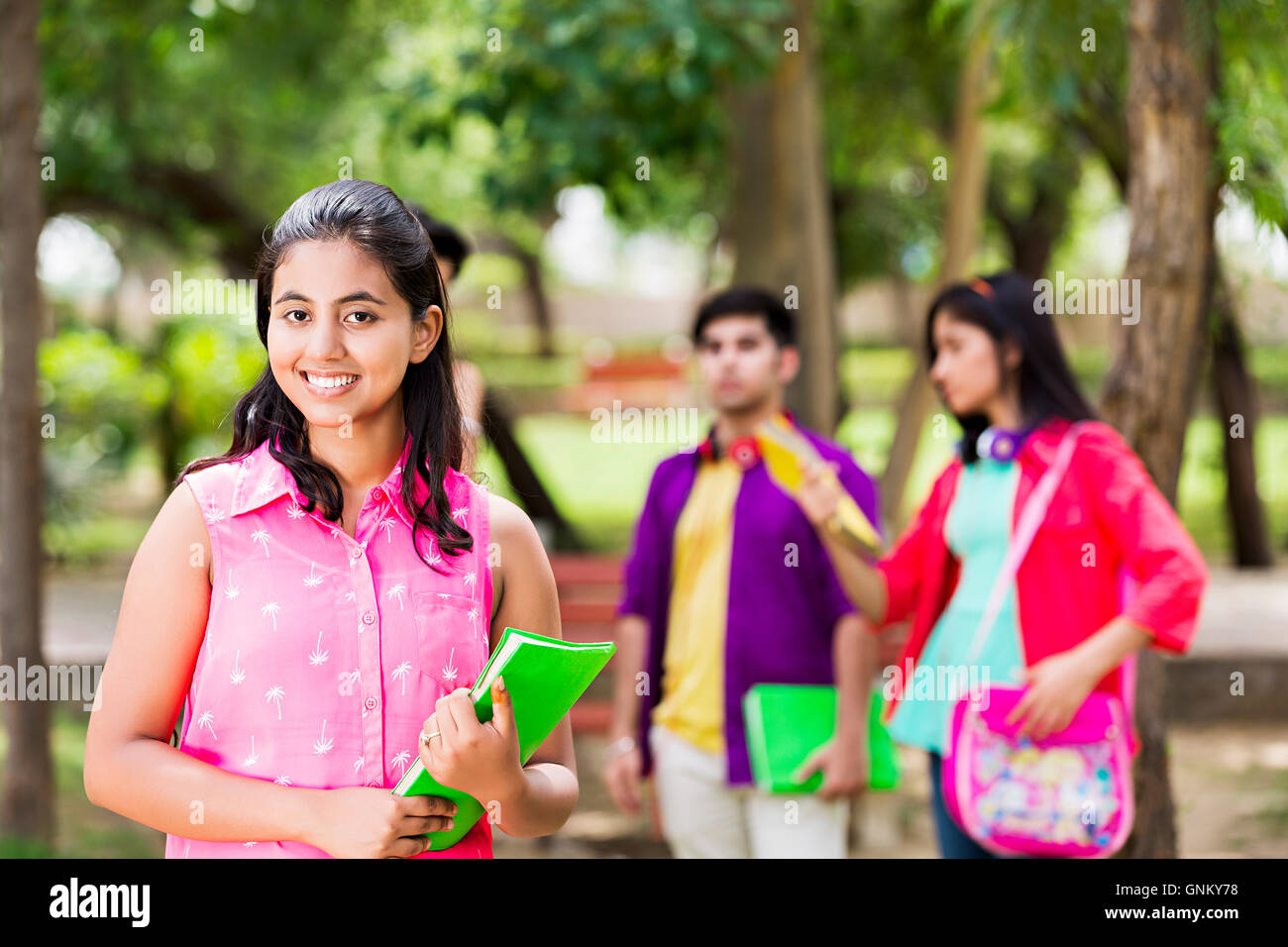 1 Young Girl College Student Park Standing Stock Photo - Alamy