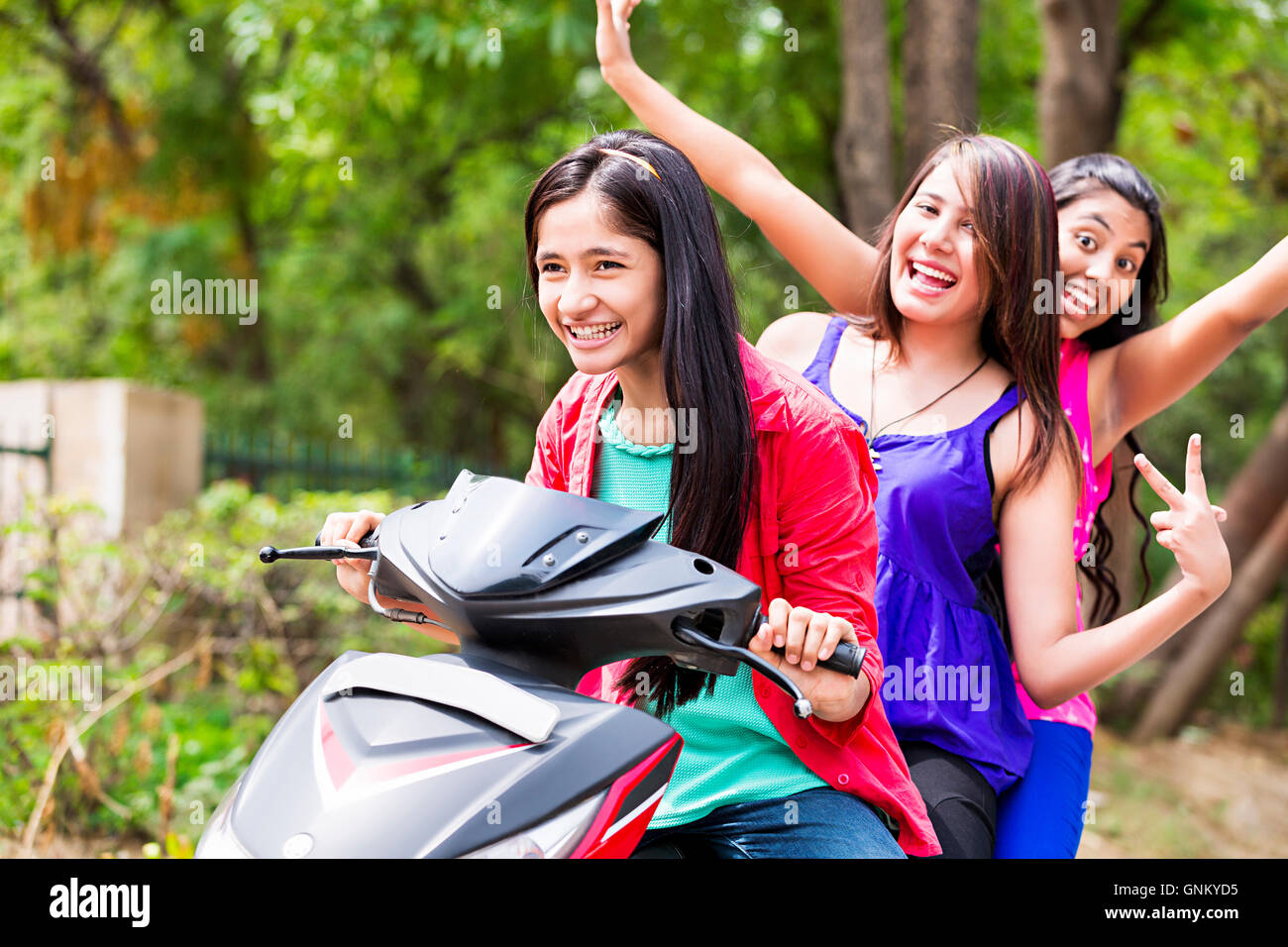 Scooty riding indian women hi-res stock photography and images - Alamy