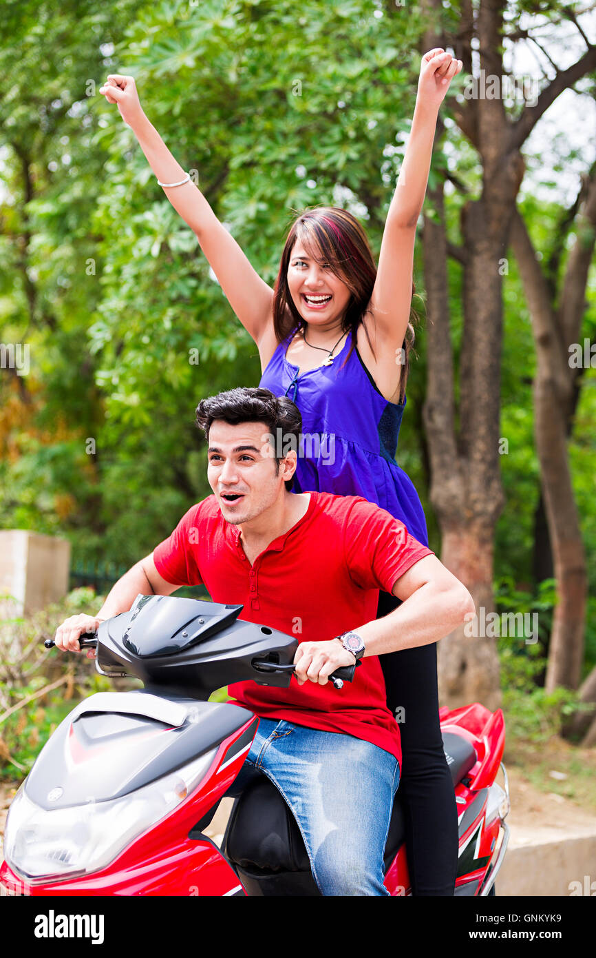 Girl riding scooty hi-res stock photography and images - Alamy