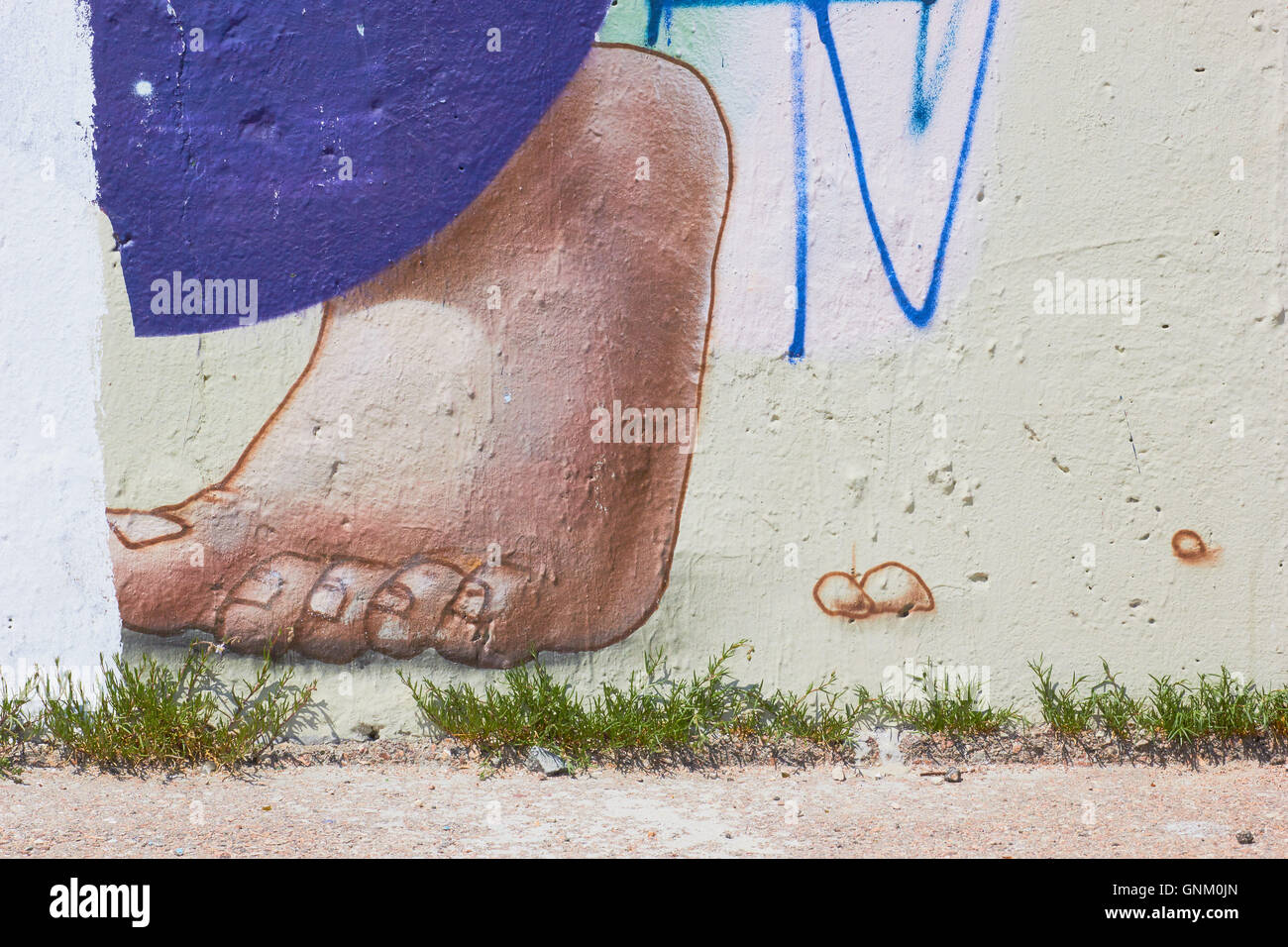 Urban graffiti of foot on concrete wall Sevastopol Crimea Stock Photo ...