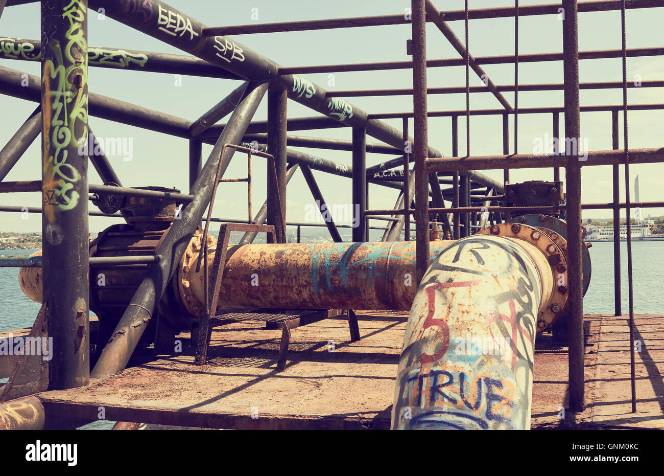 Industrial pipes and graffiti by the Black sea Sevastopol Crimea Stock ...