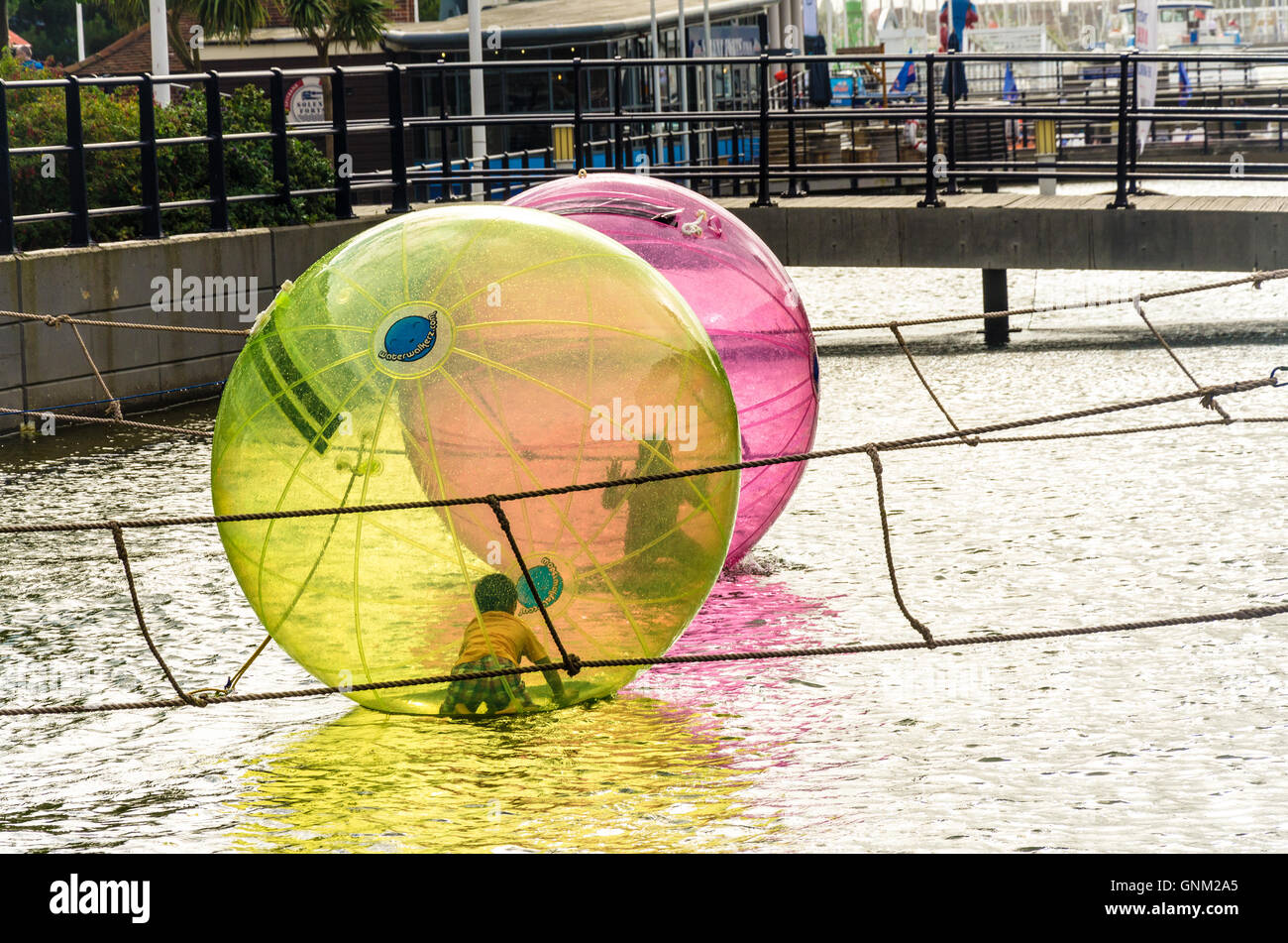 Children zorbing hi-res stock photography and images - Alamy