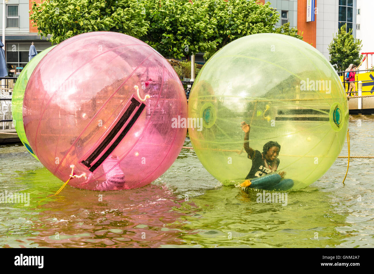 Children zorbing hi-res stock photography and images - Alamy