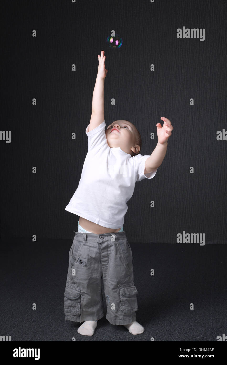 little boy playing with bubble Stock Photo - Alamy