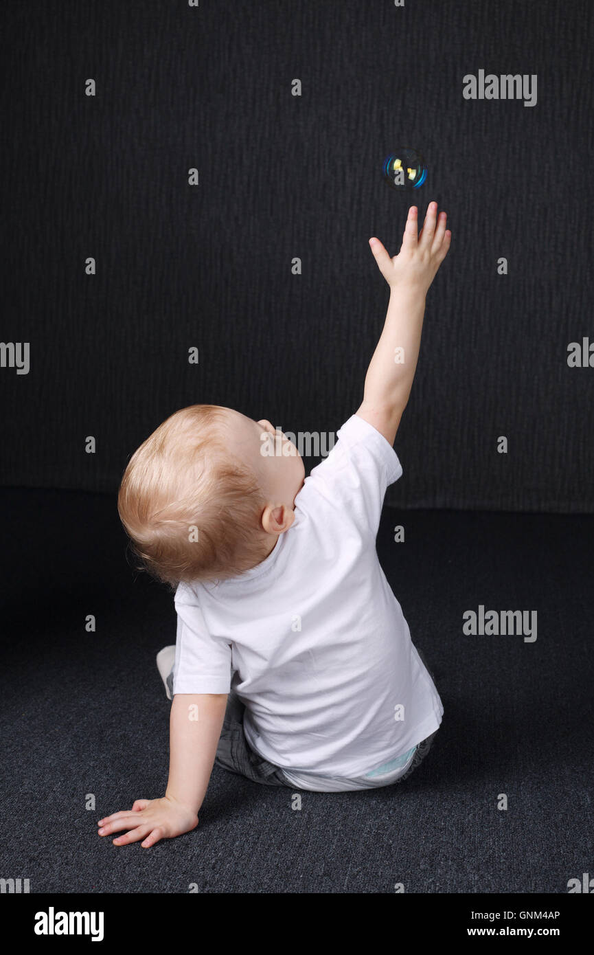 little boy playing with bubble Stock Photo - Alamy