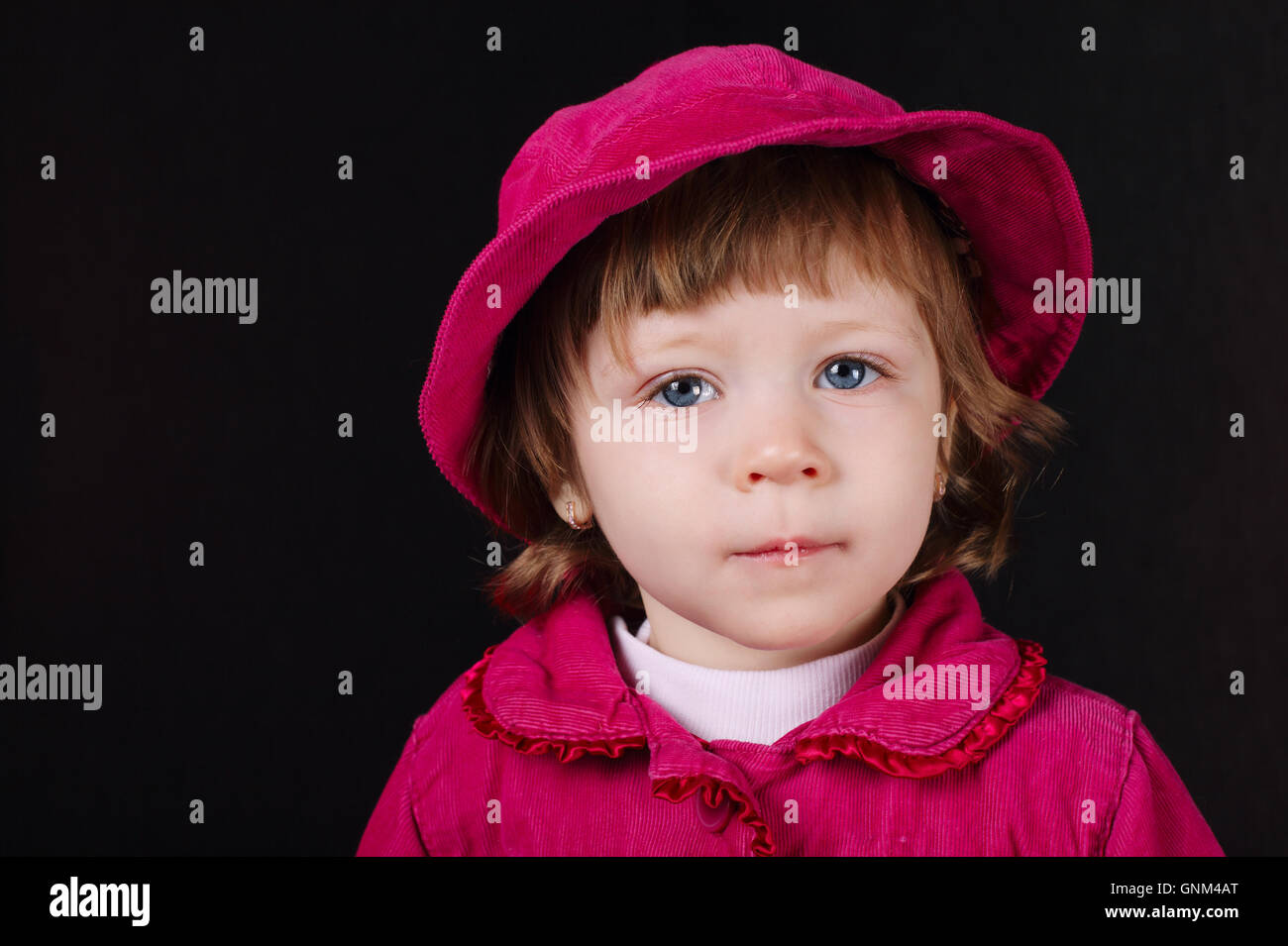 girl with pink hat portrait Stock Photo - Alamy
