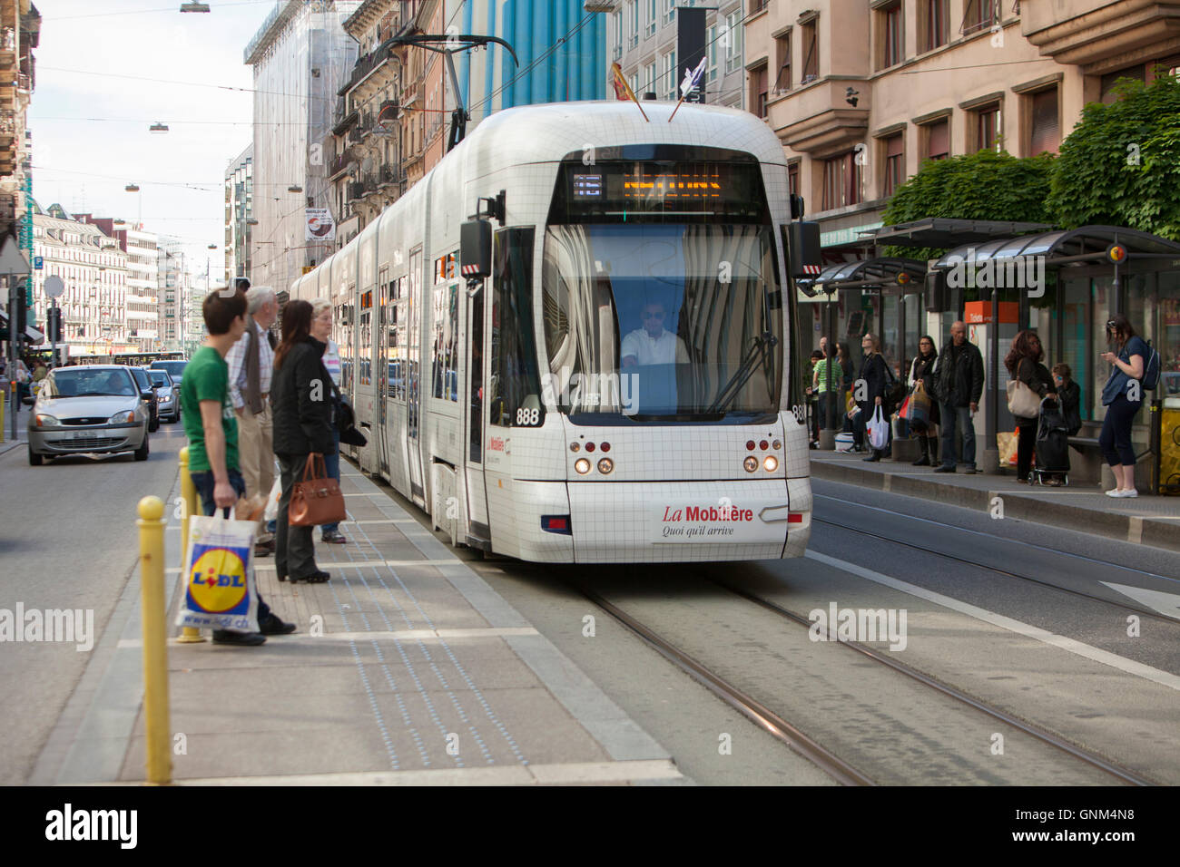 Urban tram in the city of Geneva in Switzerland Stock Photo - Alamy