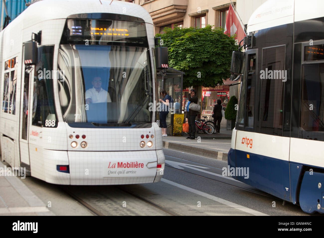 Urban tram in the city of Geneva in Switzerland Stock Photo - Alamy