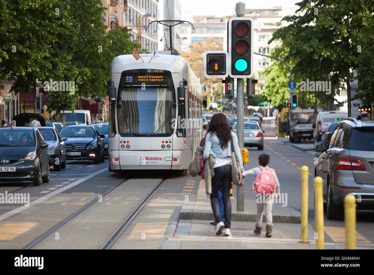 Urban tram in the city of Geneva in Switzerland Stock Photo - Alamy