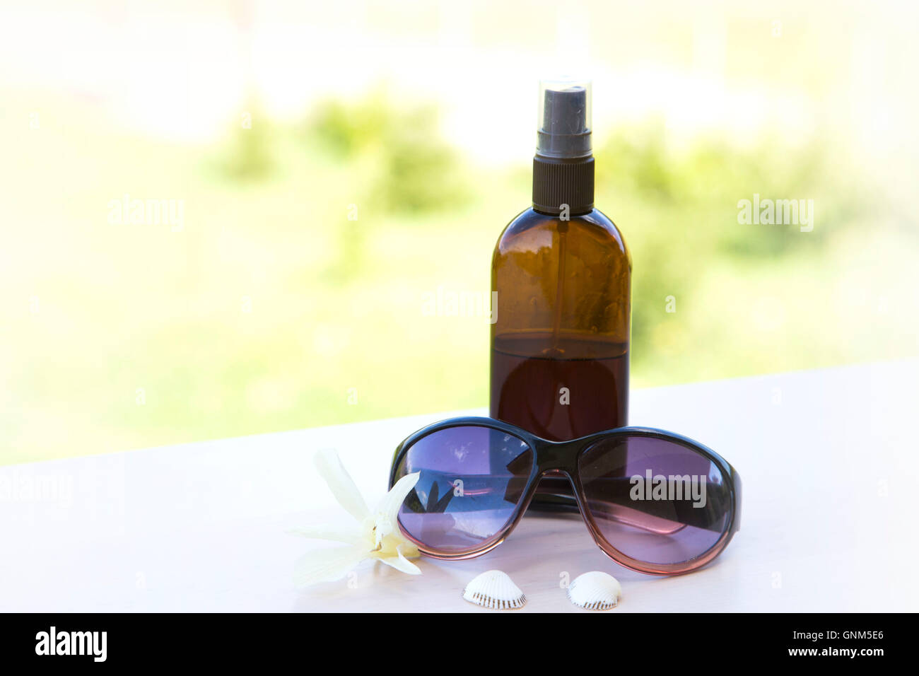 sun oil, beach concept Stock Photo - Alamy