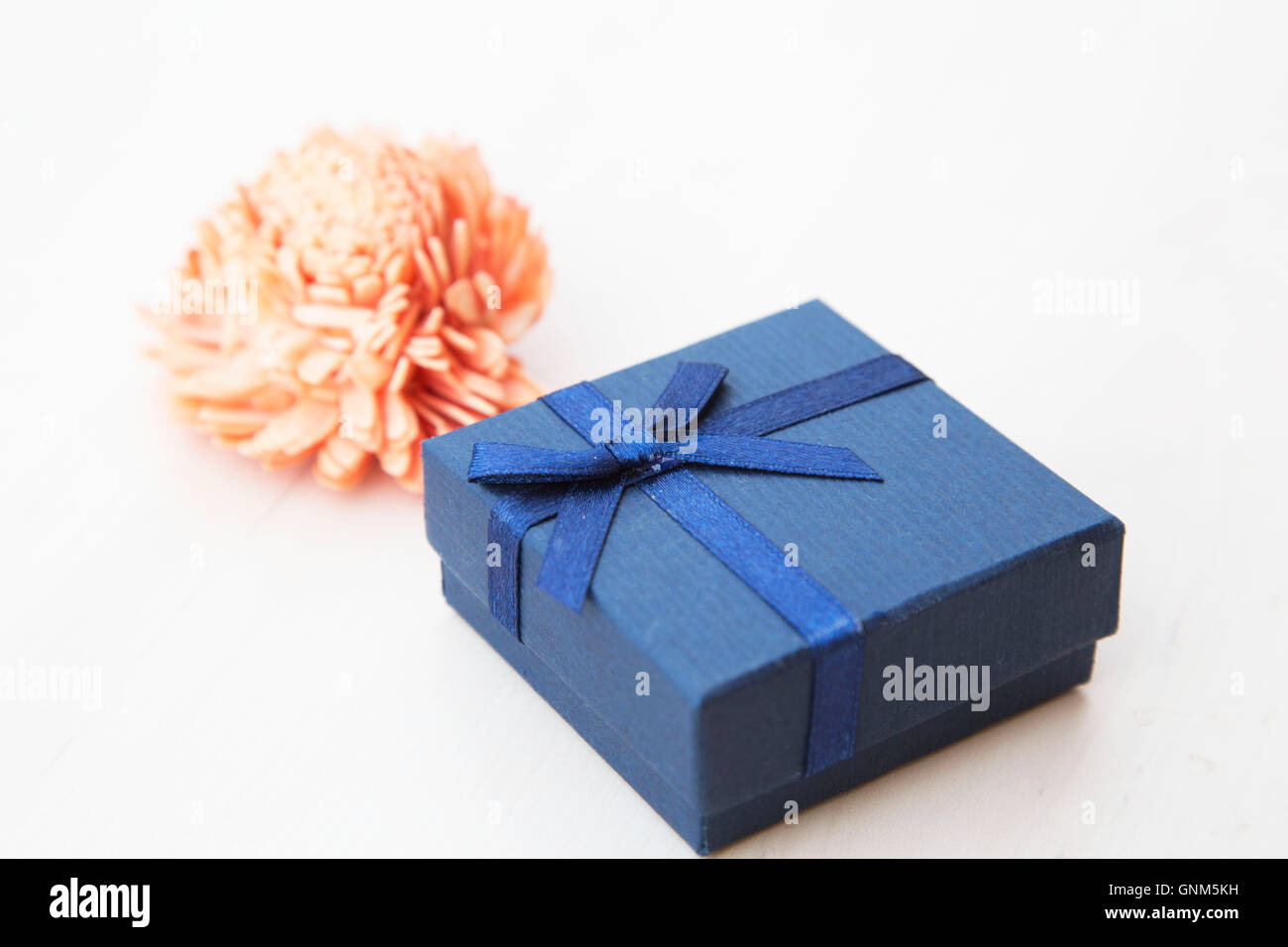 Blue ribbon gift box Stock Photo - Alamy