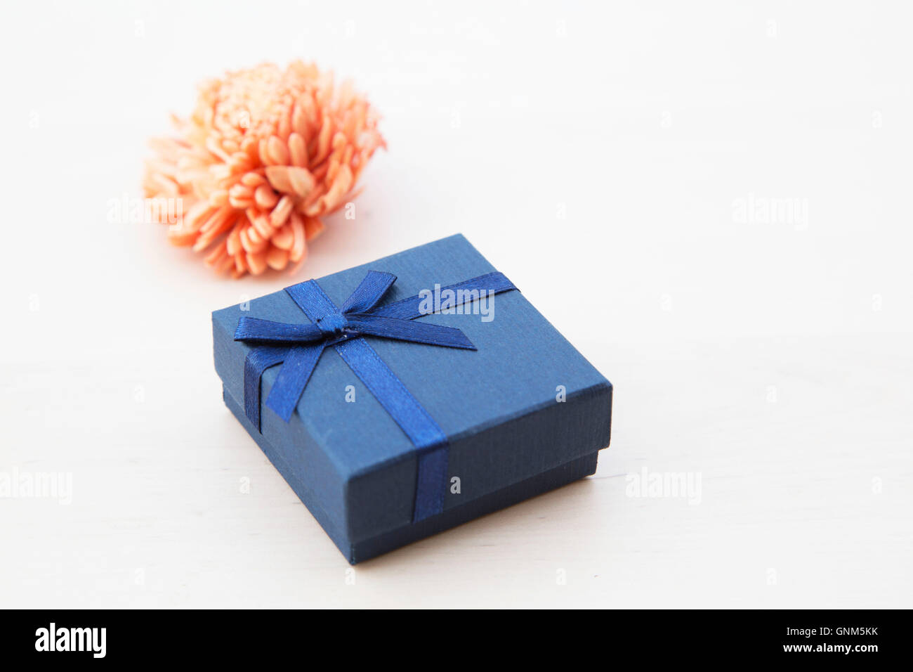 Blue ribbon gift box Stock Photo - Alamy