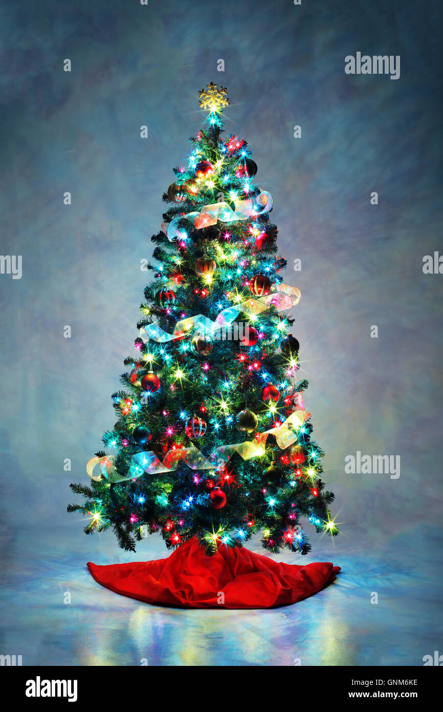 Decorated Christmas tree with colorful lights Stock Photo - Alamy