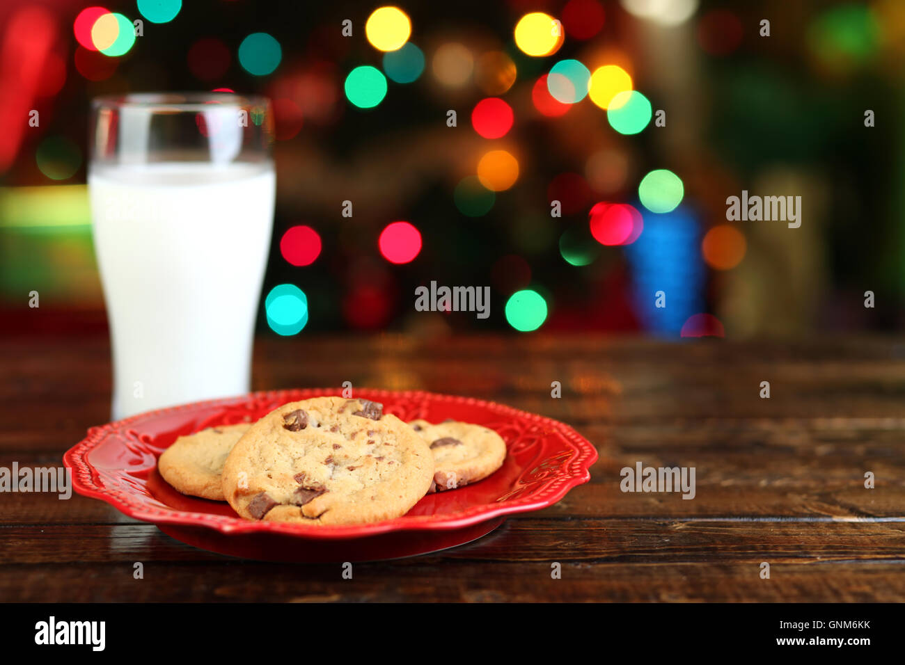 Cookies and milk for Santa Claus in front of a Christmas tree Stock ...