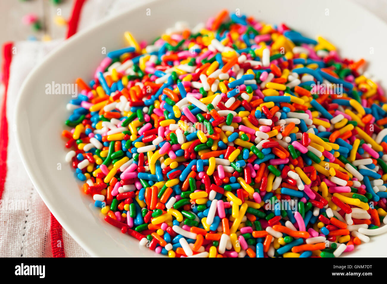 Bright colored rainbow sprinkles in hi-res stock photography and images ...