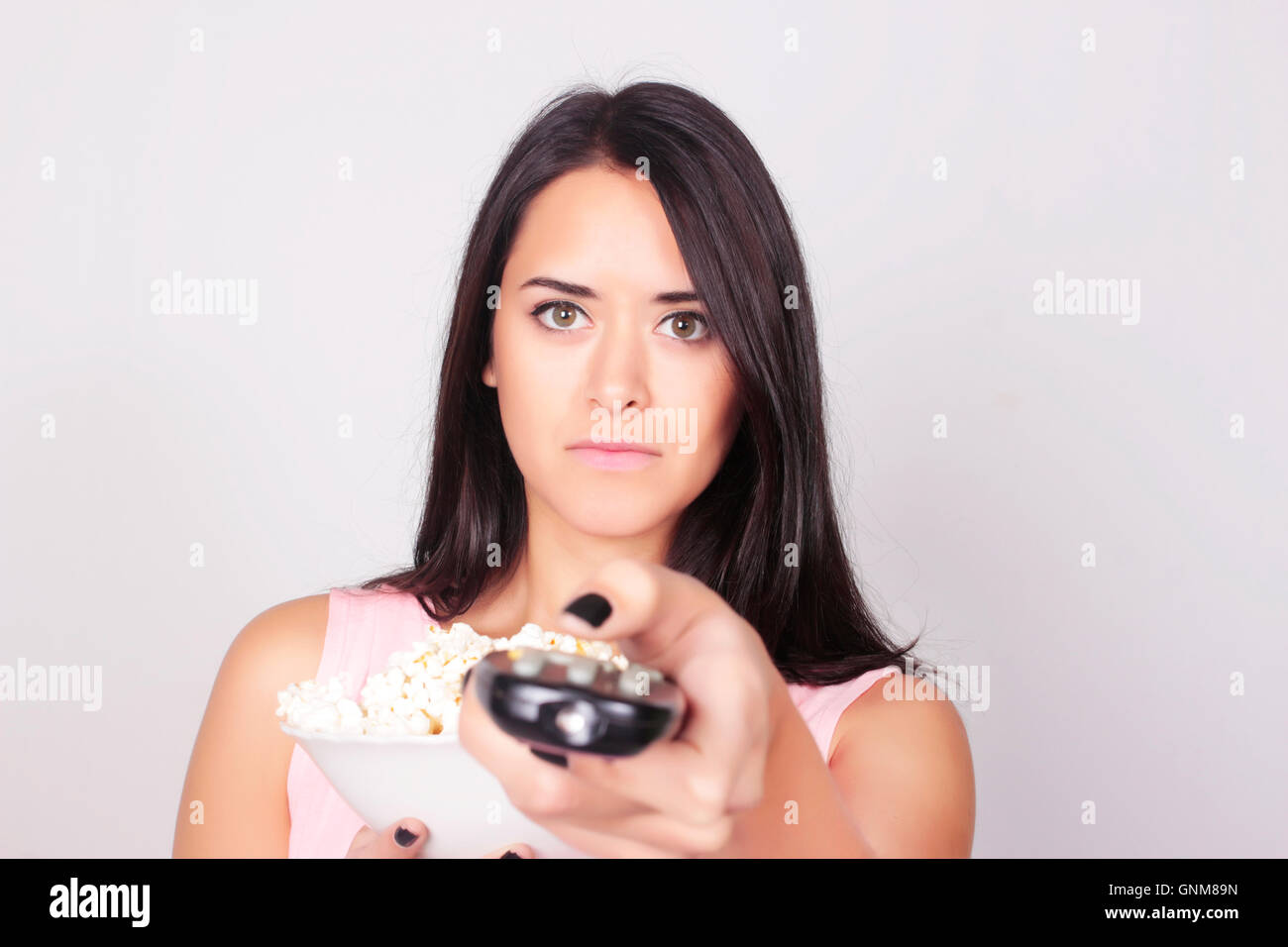 Woman snack television hi-res stock photography and images - Alamy