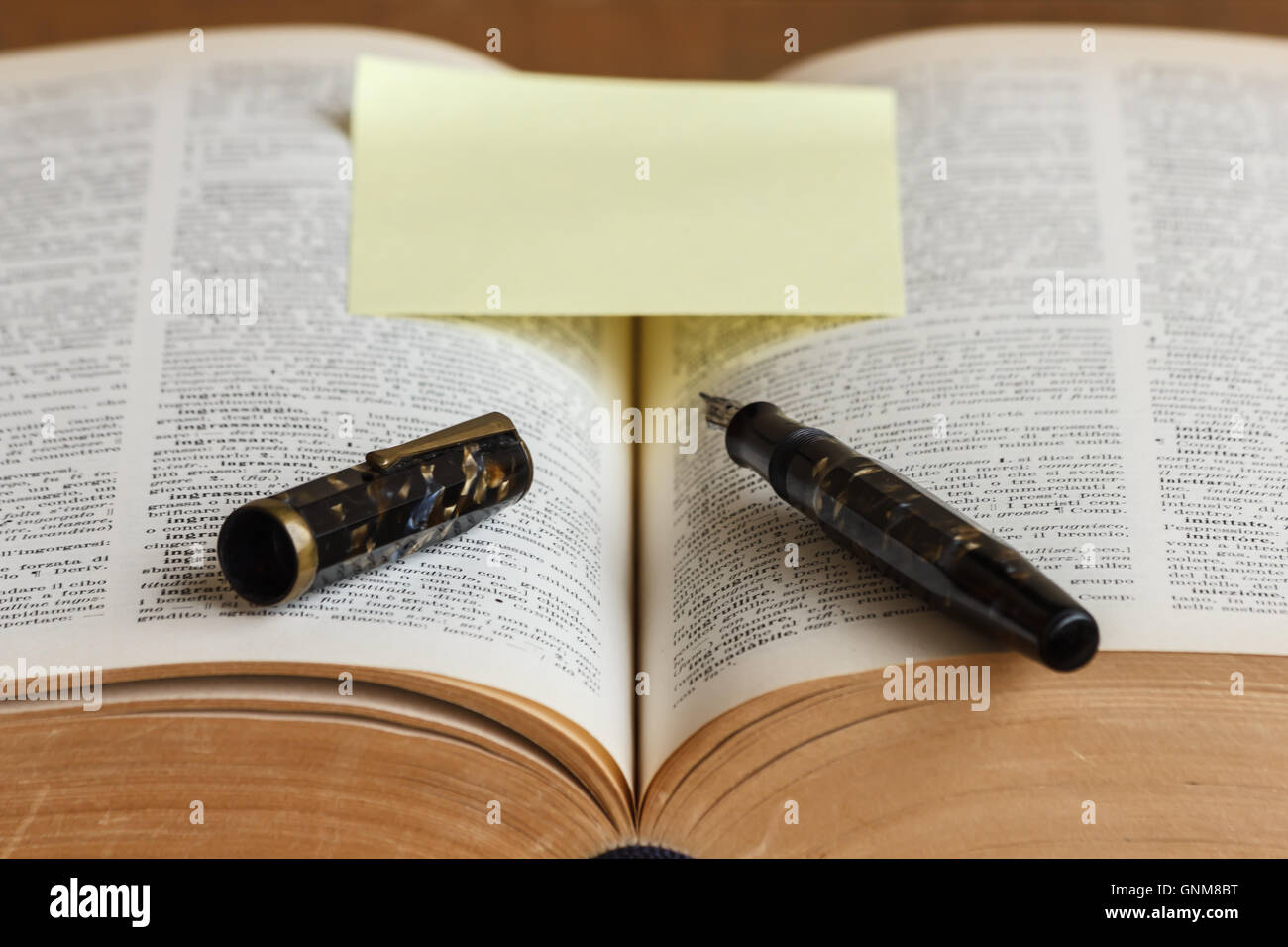 a book with a fountain pen ink Stock Photo - Alamy