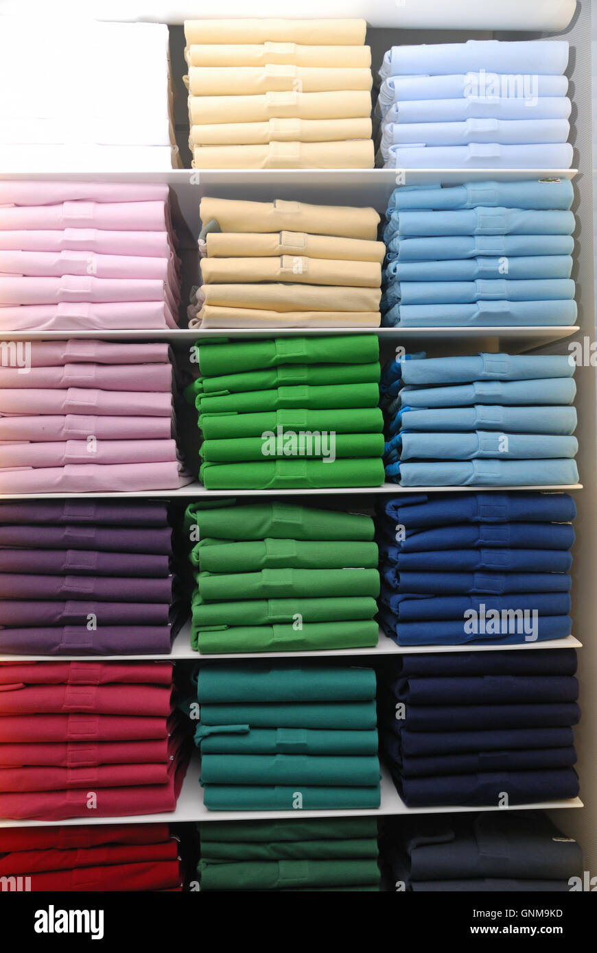 T-shirts in different colors Stock Photo - Alamy