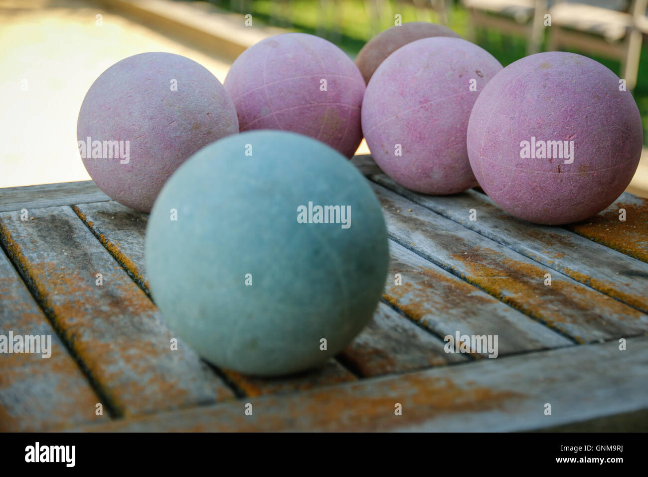 Bocce ball balls in pink and blue Stock Photo - Alamy