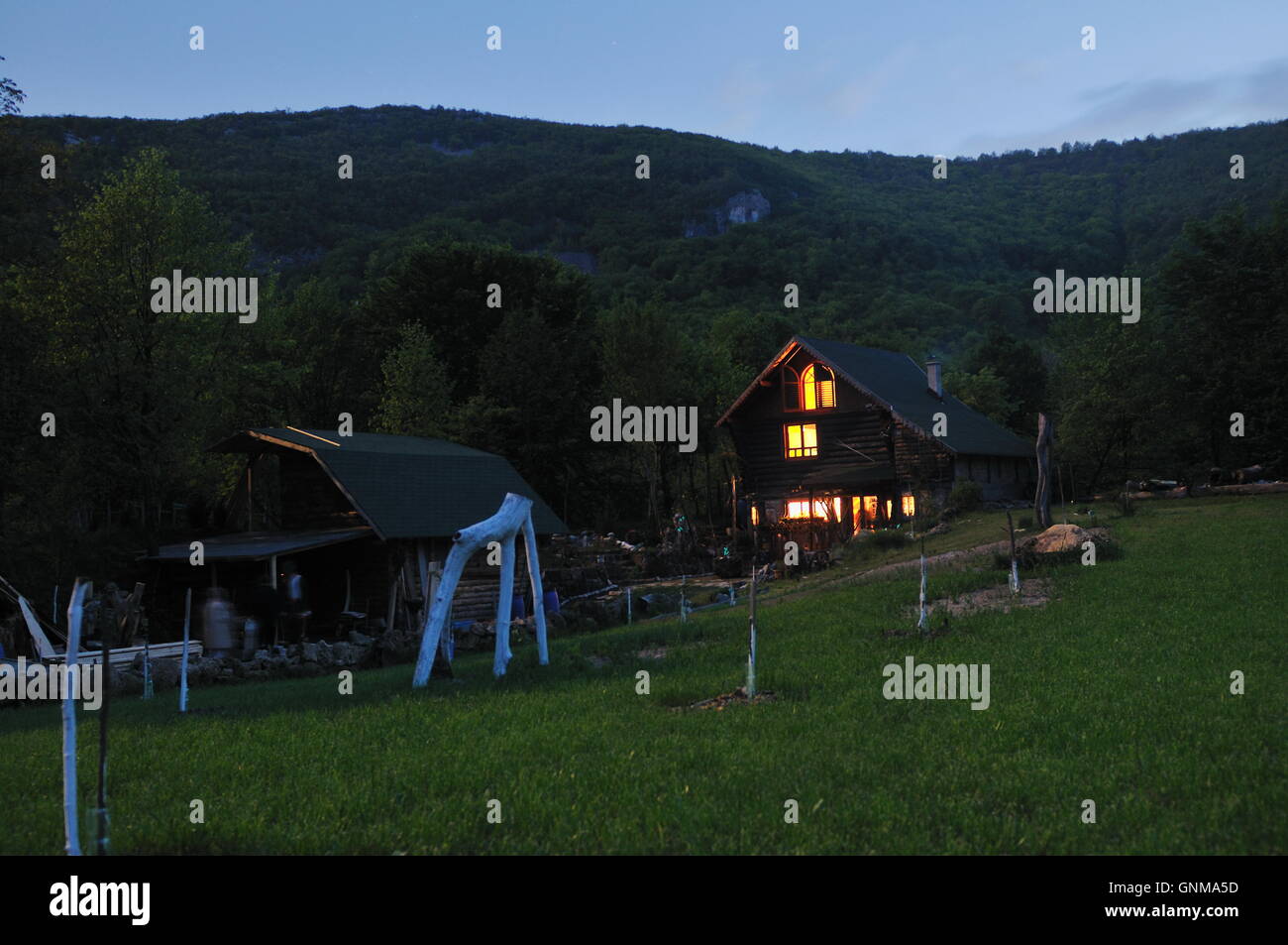 wooden countryside house in night Stock Photo - Alamy