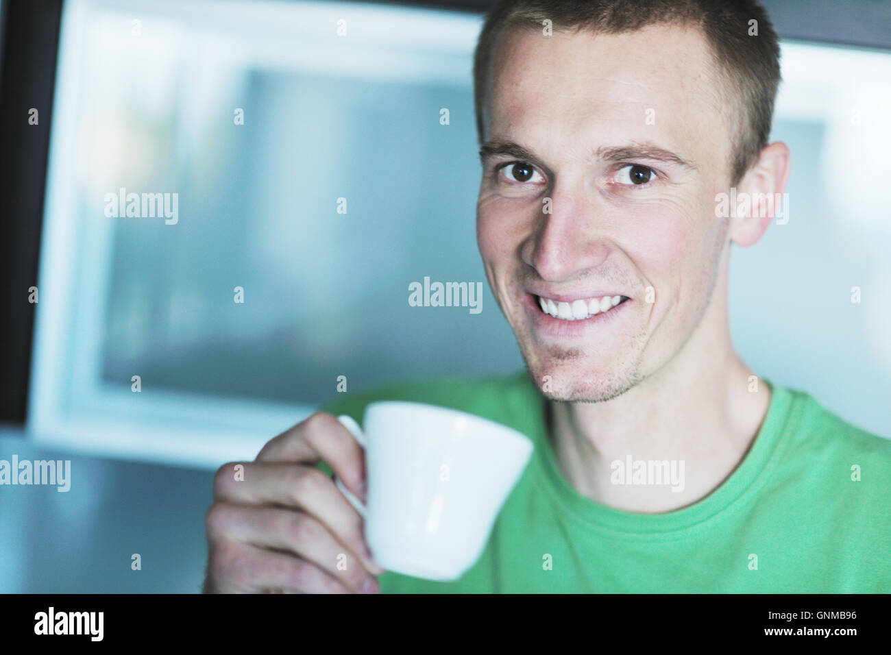 handsome young man drink fresh morning coffee Stock Photo - Alamy