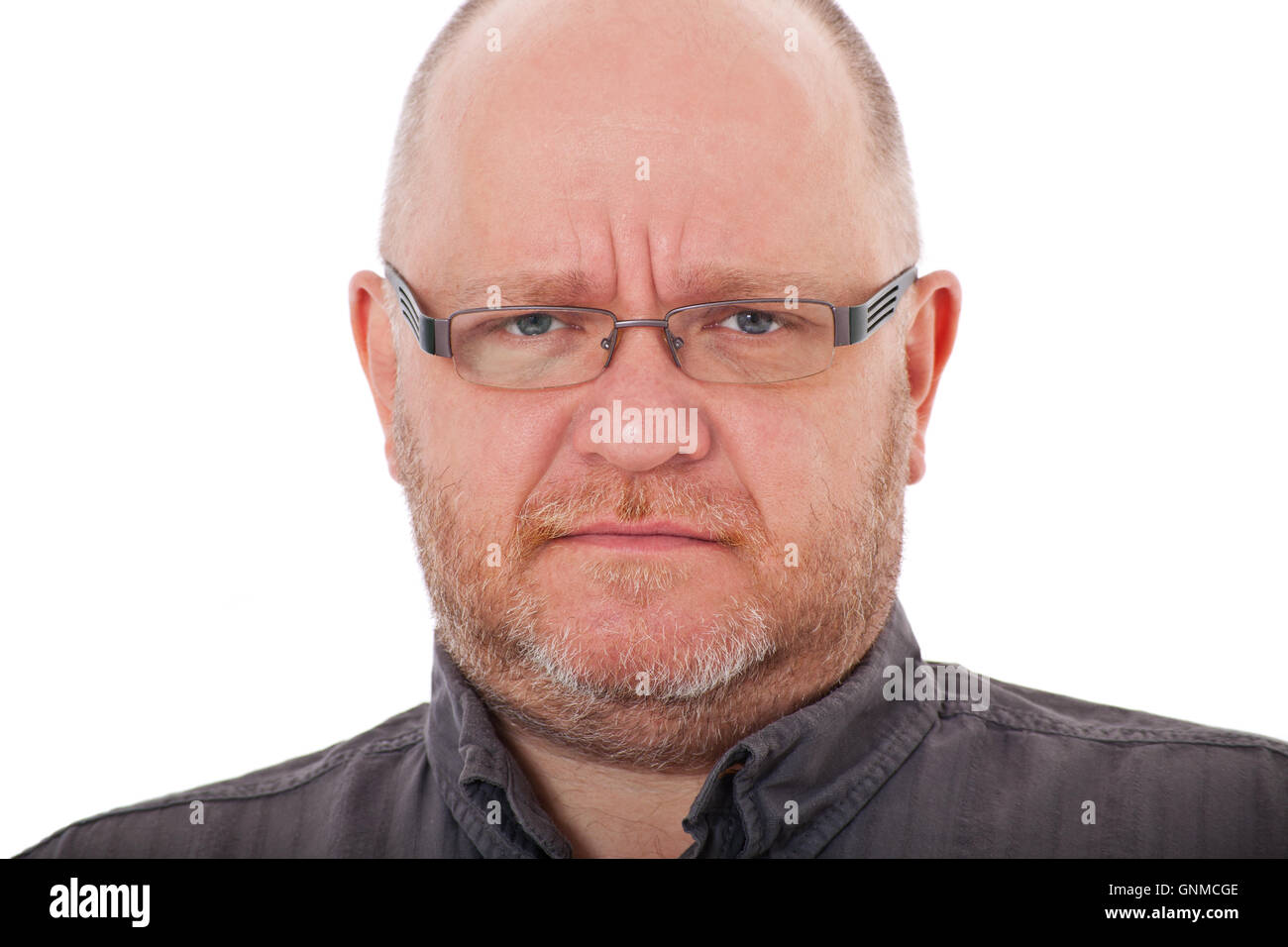Elderly man in bad mood Stock Photo - Alamy