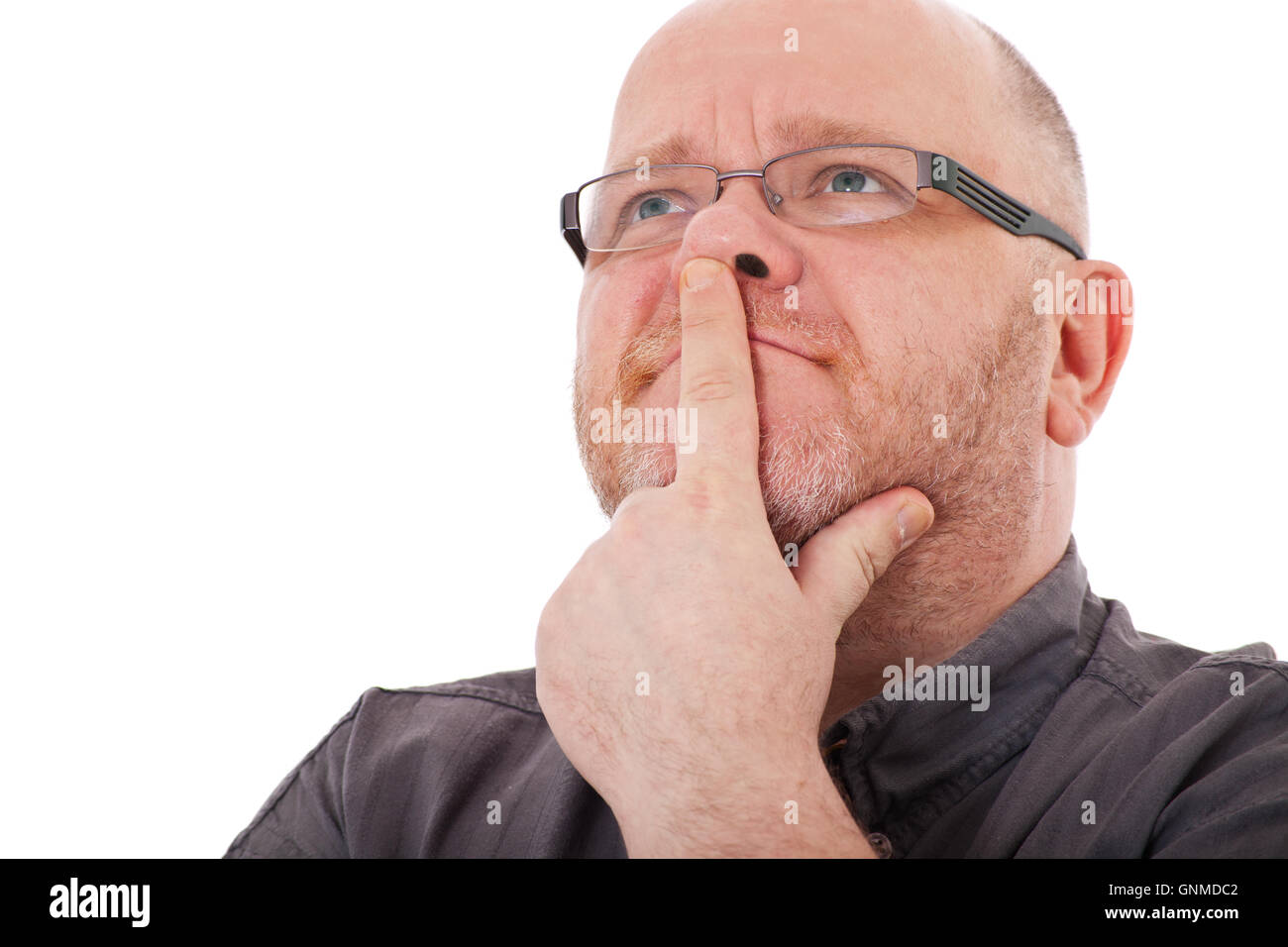 Elderly man pondering a decision Stock Photo - Alamy