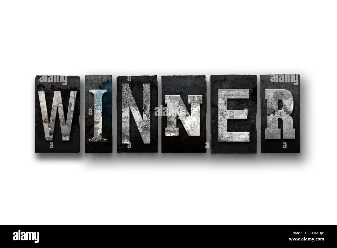 The word "WINNER" written in vintage, dirty, ink stained letterpress ...