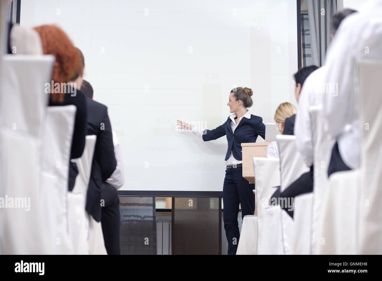 business woman giving presentation Stock Photo - Alamy
