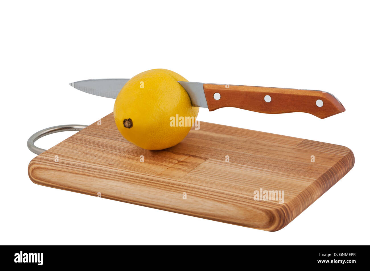 Kitchen knife yellow lemon cut Cut Out Stock Images & Pictures - Alamy