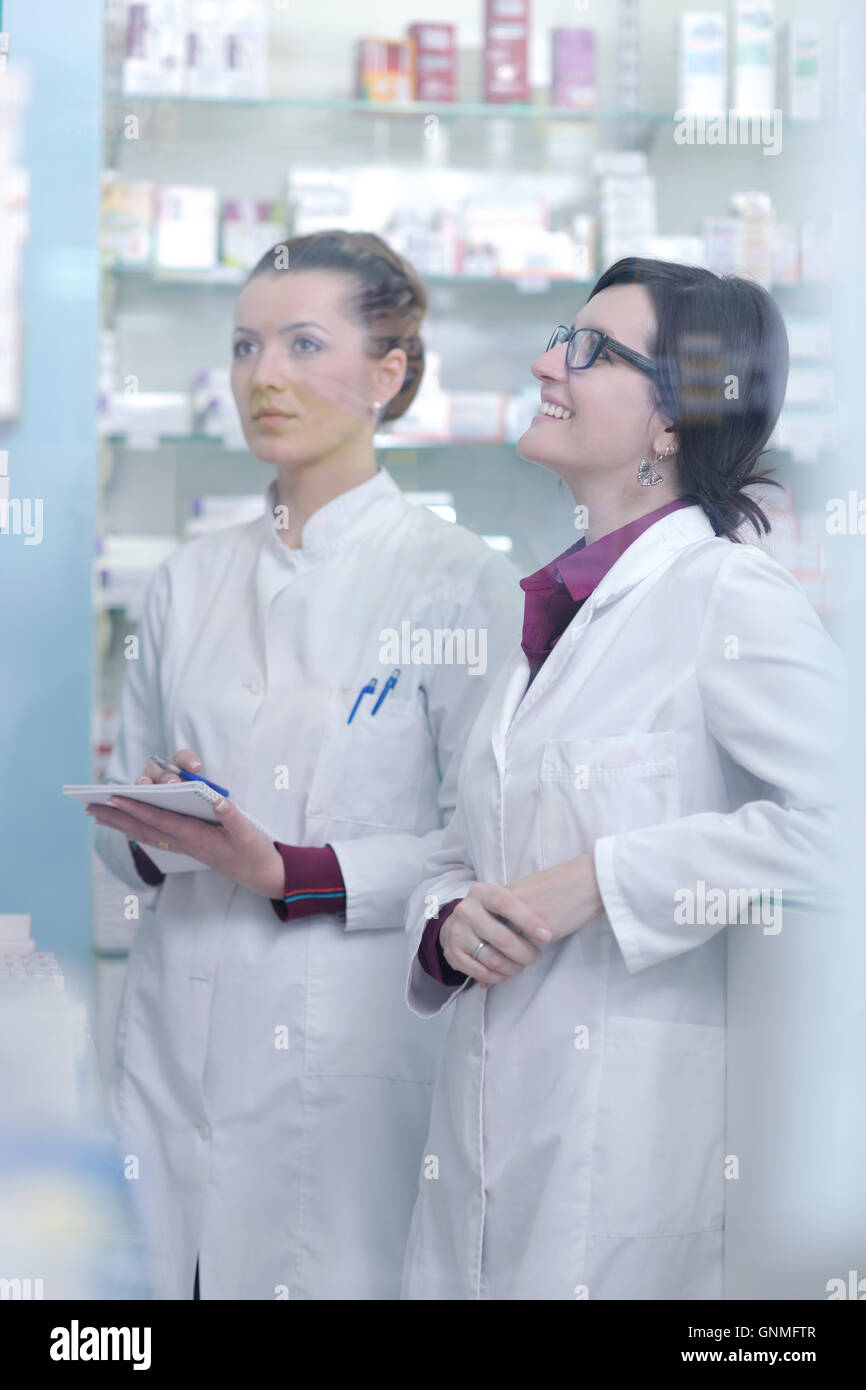 team of pharmacist chemist woman in pharmacy drugstore Stock Photo - Alamy