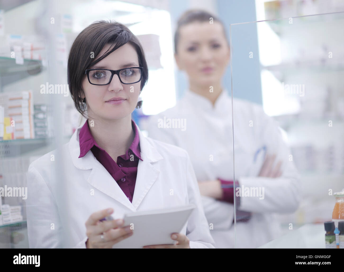 team of pharmacist chemist woman in pharmacy drugstore Stock Photo - Alamy