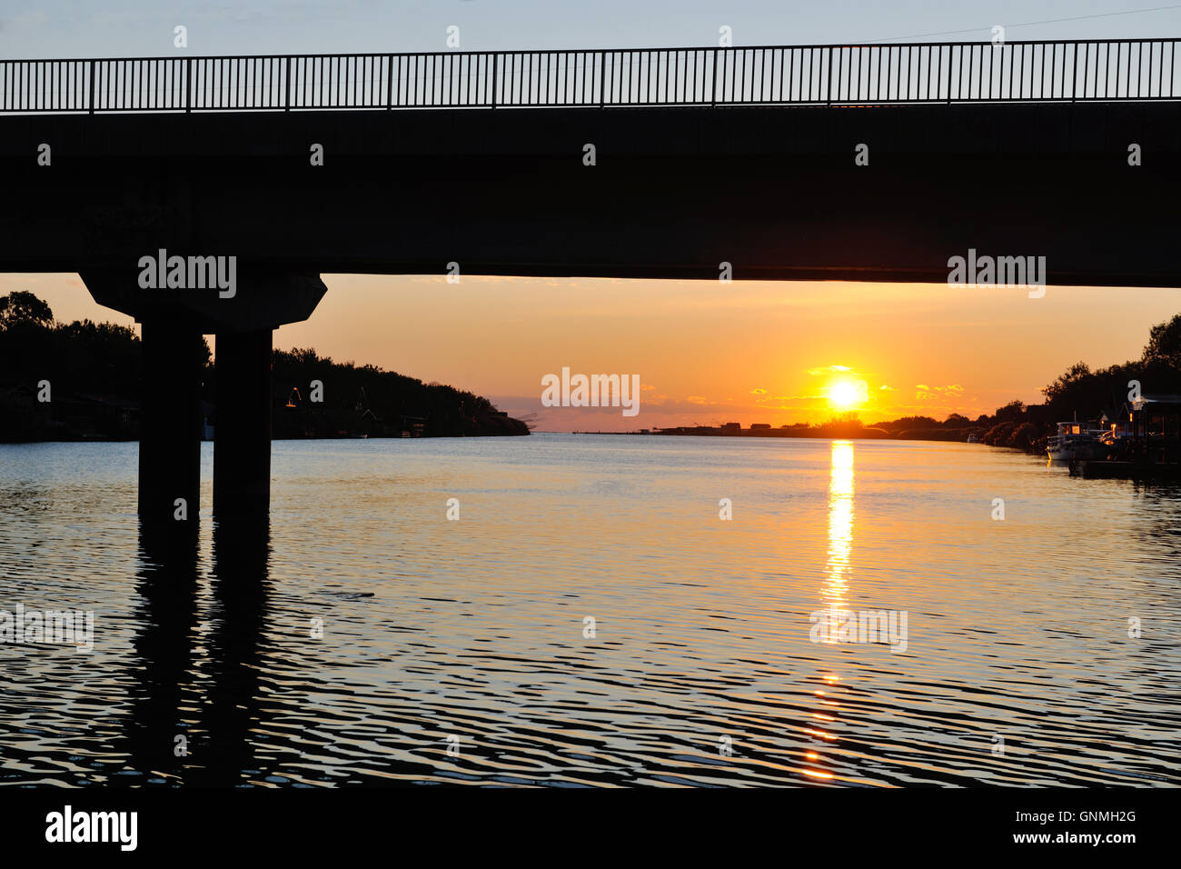 sunset on river Stock Photo - Alamy