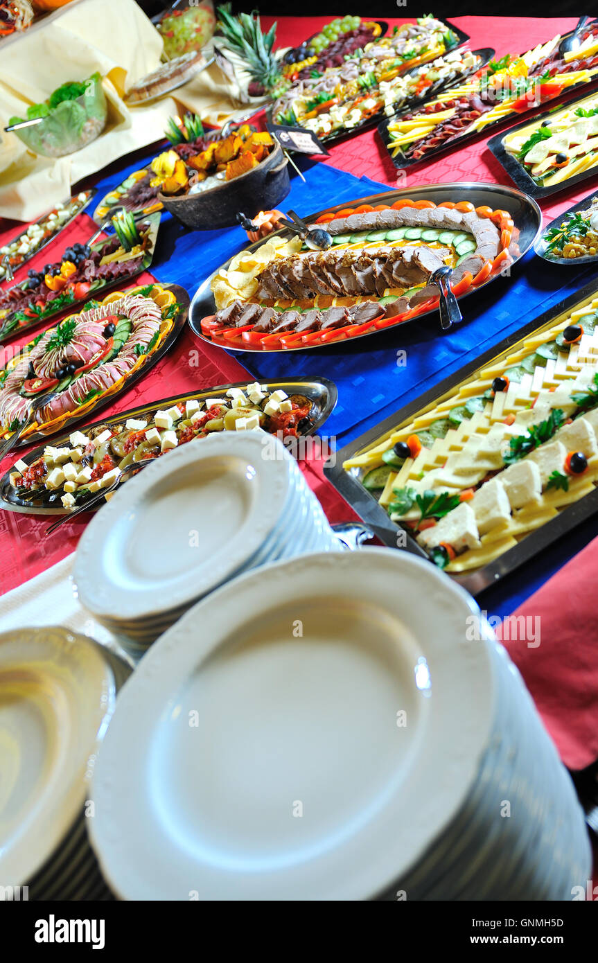 Catering food arrangement on table Stock Photo - Alamy