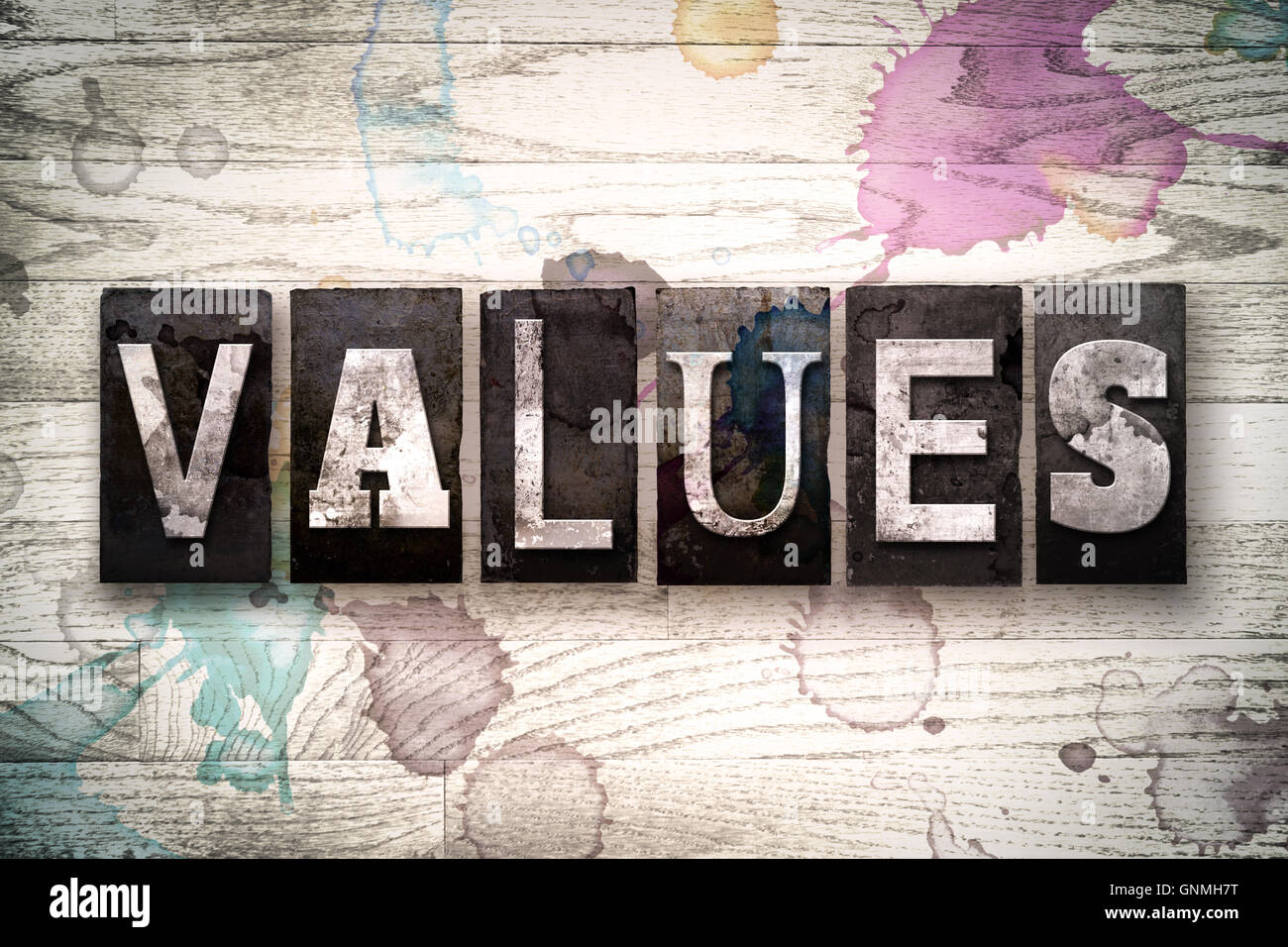 The word "VALUES" written in vintage, dirty metal letterpress type on a ...