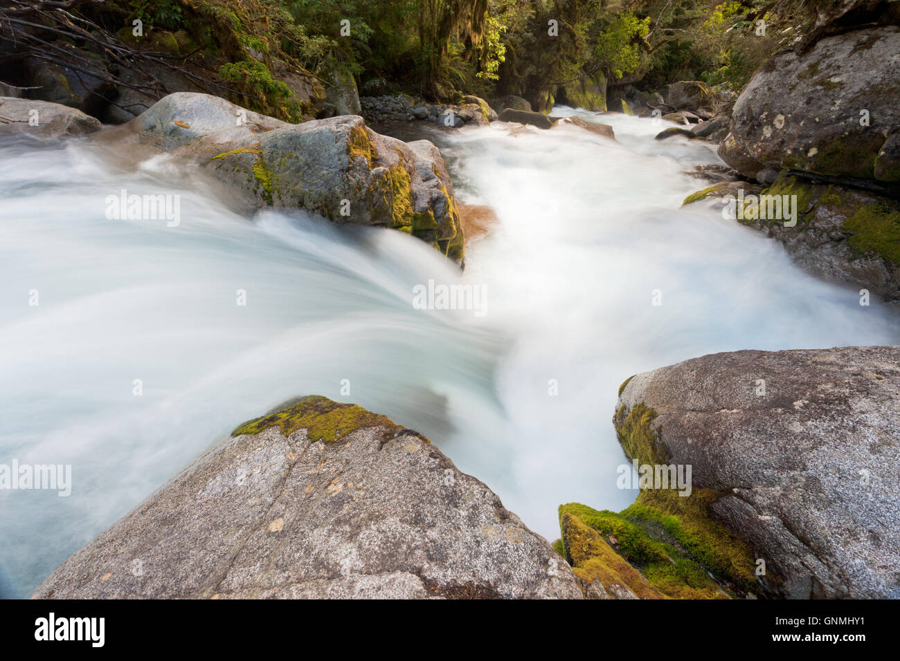 River rapids washing over rocks with silky look Stock Photo - Alamy