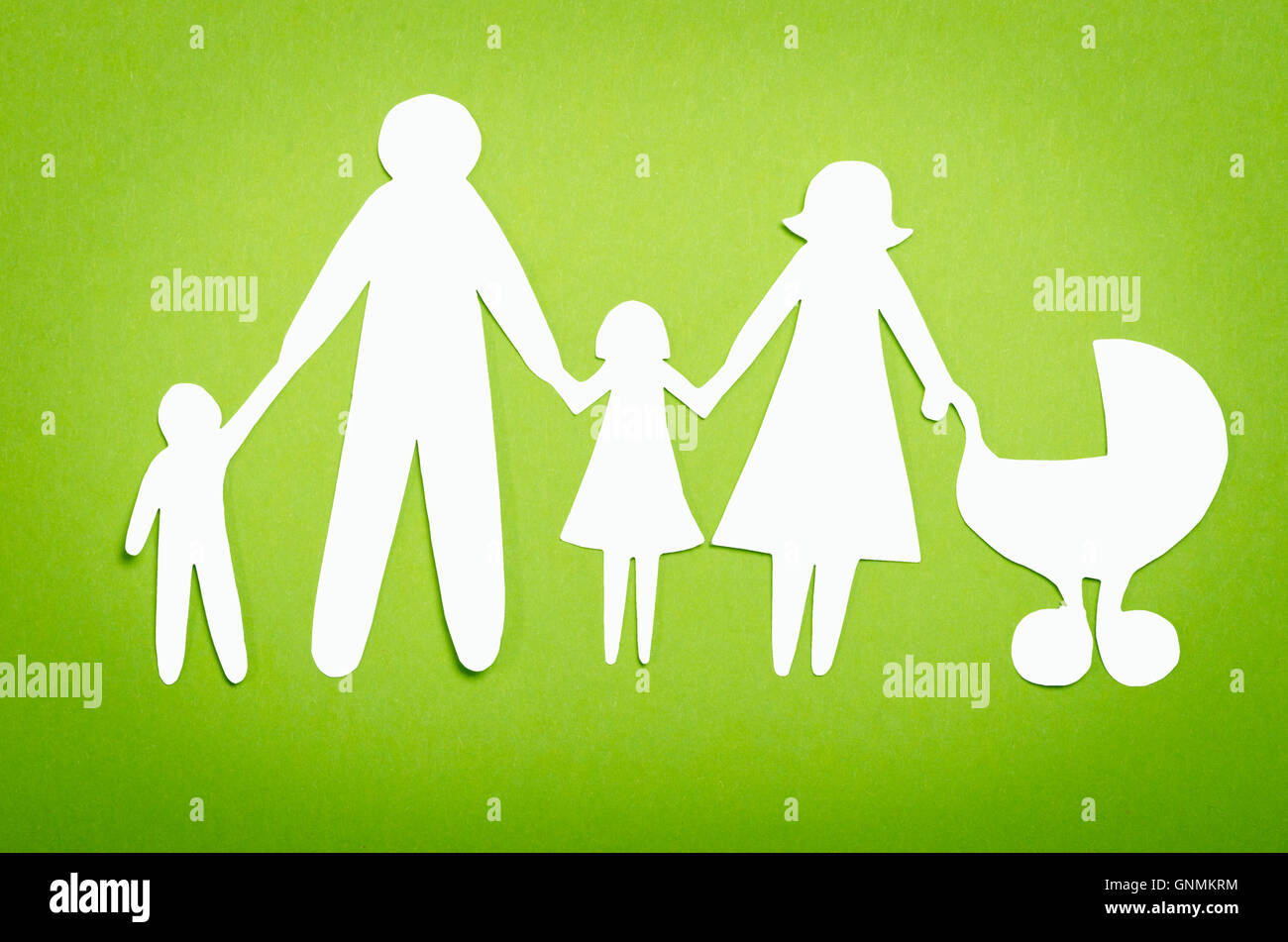 Closeup of paper family on white background Stock Photo - Alamy