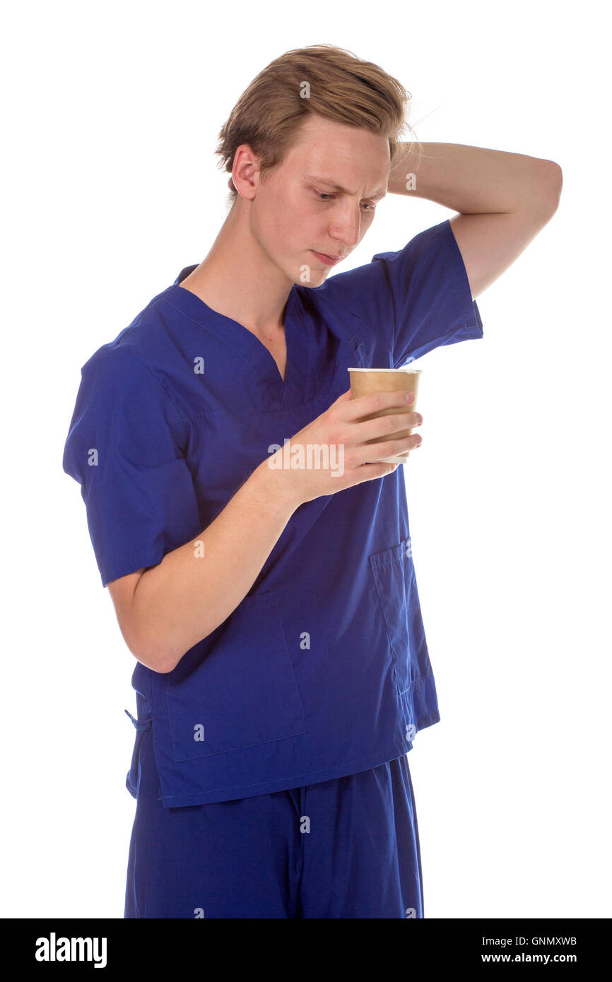 Tired doctor with cup of coffee, isolated on white background Stock ...