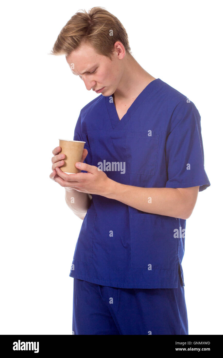 Doctor examines something in a cup of tea, isolated on white background ...