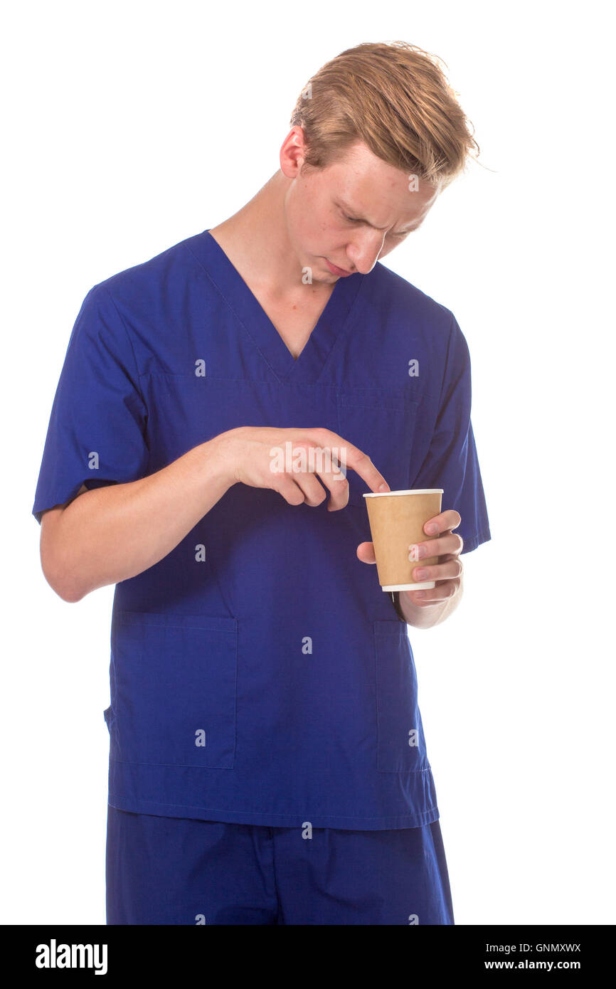 Doctor examines something in a cup of tea, isolated on white background ...