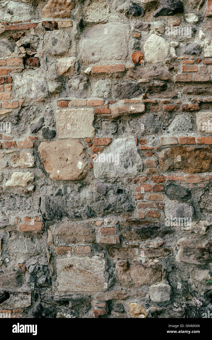 Close up of worn brick wall texture background Stock Photo - Alamy