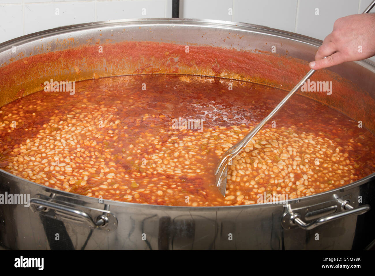 chef cooking beans at commercial kitchen-bean Stock Photo - Alamy