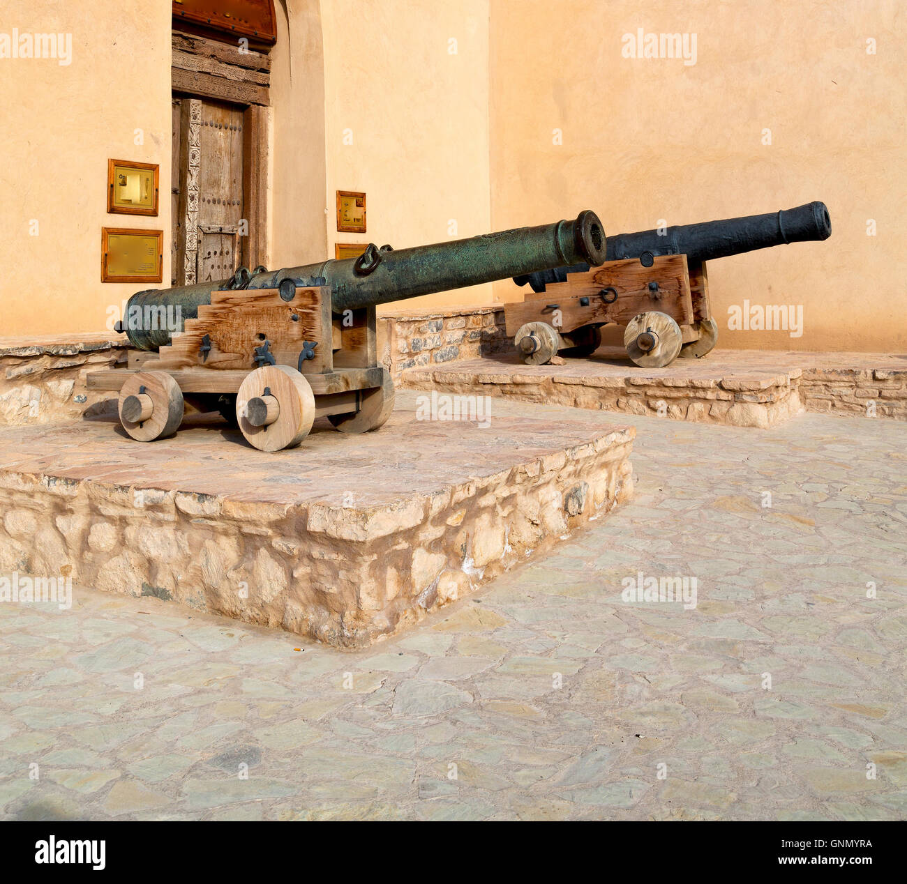 castle and cannon near the wall in oman muscat the old Stock Photo - Alamy