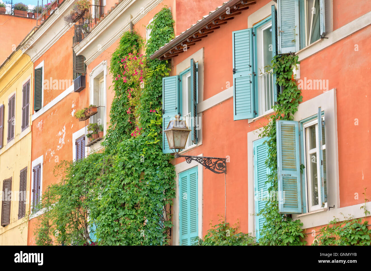 Traditional Italian alley with street lamp Stock Photo - Alamy