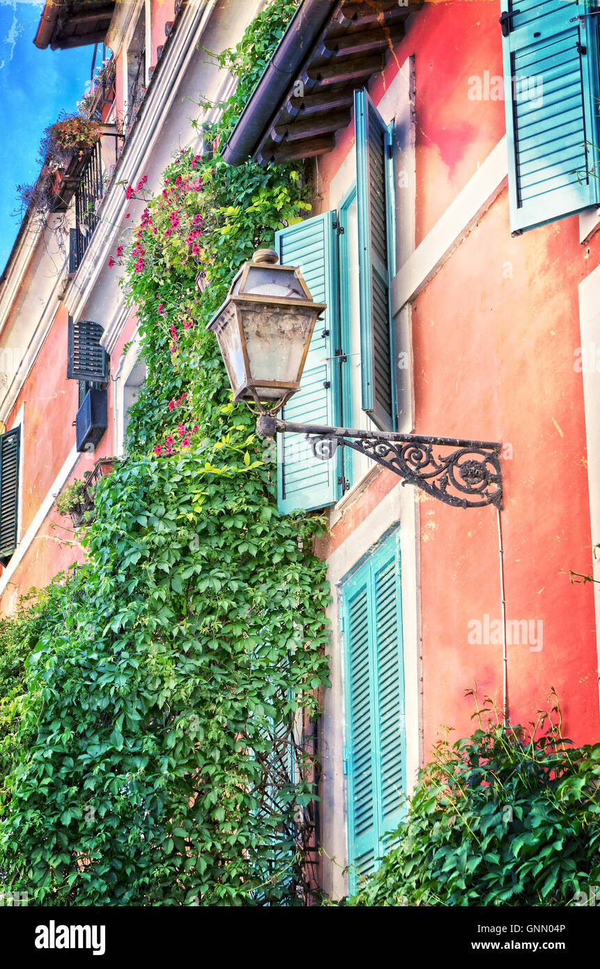 Traditional Italian alley with street lamp Stock Photo - Alamy