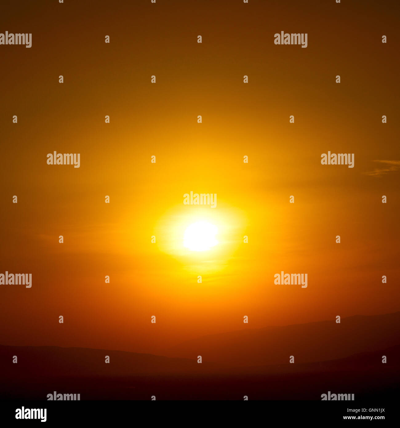 the blurred sun falling down arabian mountain in oman Stock Photo - Alamy