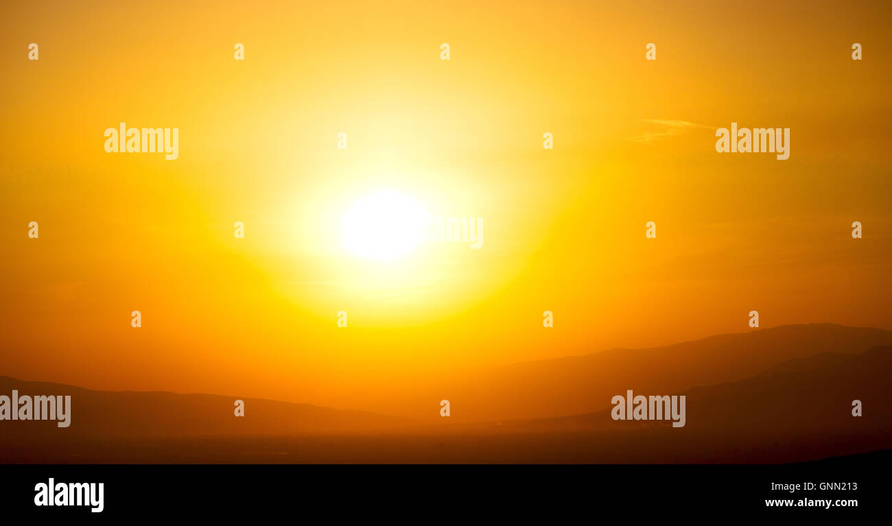 the blurred sun falling down arabian mountain in oman Stock Photo - Alamy