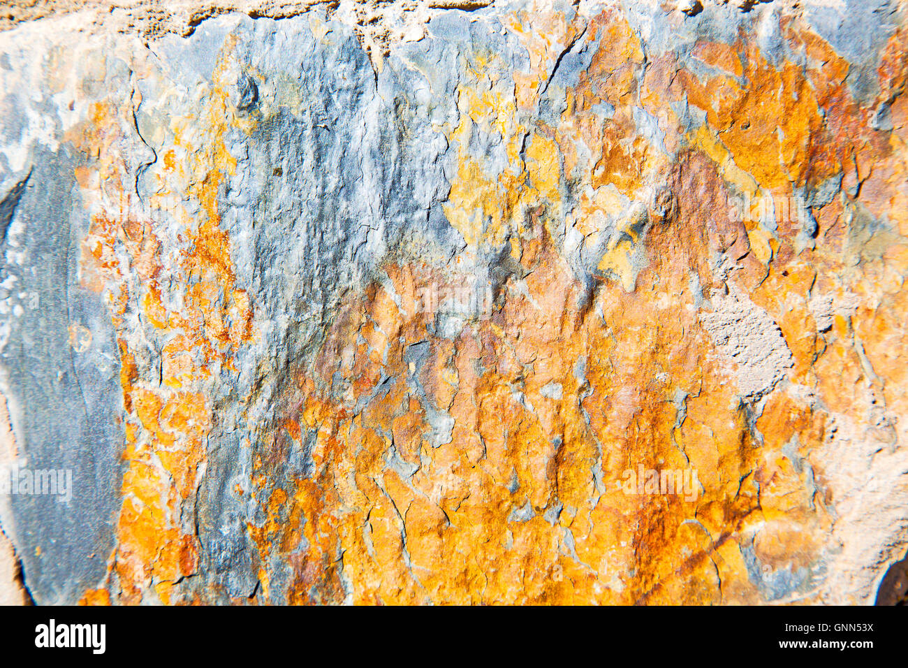 rocks stone and red orange gneiss in the wall of morocco Stock Photo ...