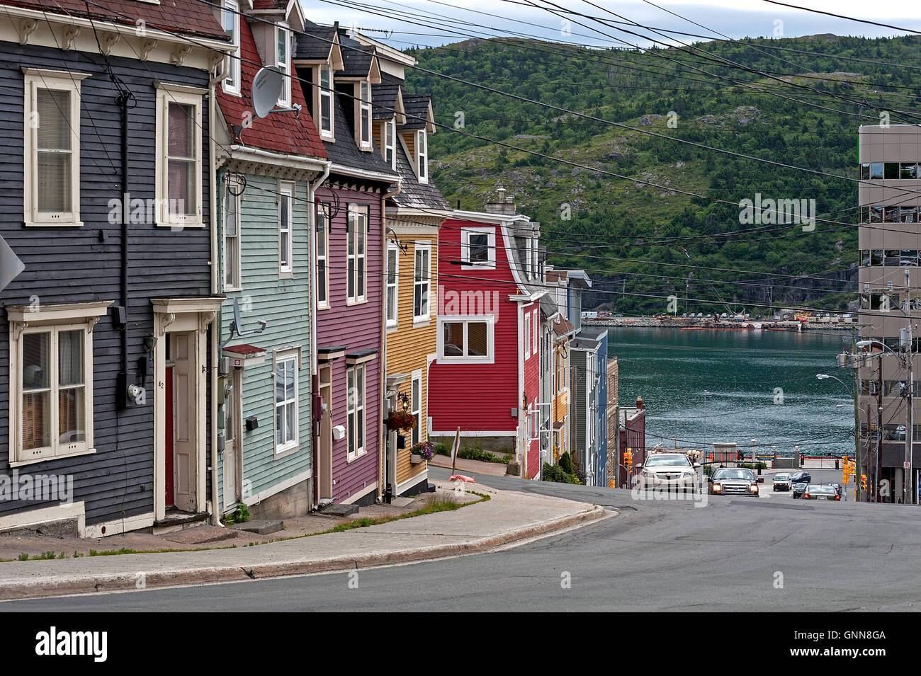 Brightly painted row houses on hillside in city Stock Photo - Alamy Brightly painted row houses on hillside in city Stock Photo - Alamy
